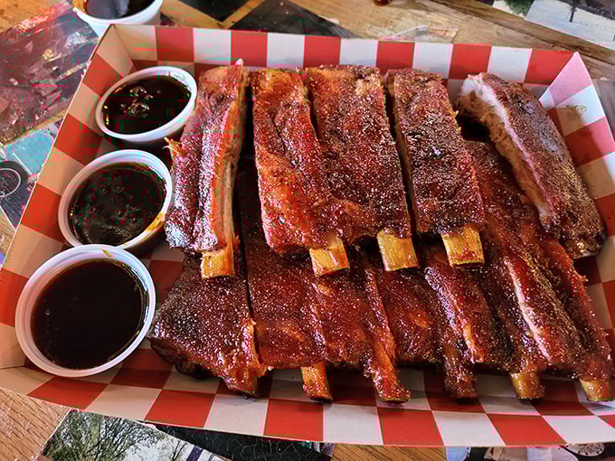 These ribs aren't just falling off the bone&mdash;they're practically volunteering to jump onto your plate, glistening with a perfect lacquer of sauce and spice.