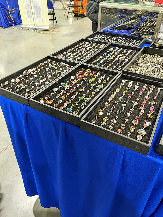 Jewelry displays that would make Aladdin jealous! Hundreds of rings sparkle under display lights, each one holding the promise of becoming someone's favorite accessory.