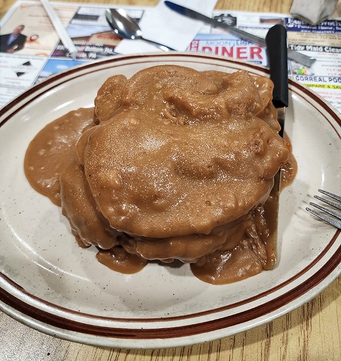 Hot roast beef sandwich drowning in gravy &ndash; comfort food that doesn't just speak to your soul, it gives it a warm bear hug.