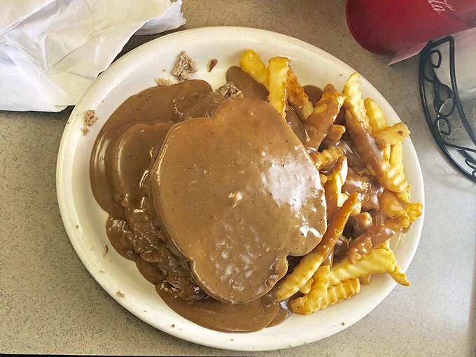 Hot roast beef swimming in rich gravy alongside golden fries &ndash; comfort food that hugs your soul on those brutal Cleveland winter days.