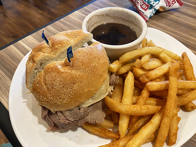 Behold the roast beef sandwich that launched a thousand return visits, served with au jus perfection.