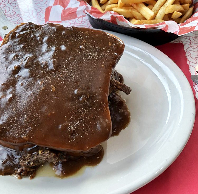 Not all heroes wear capes&mdash;some come smothered in gravy. This roast beef sandwich demands both hands and possibly a moment of silent appreciation.