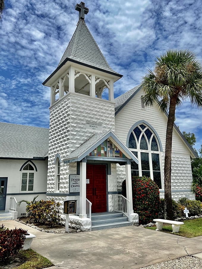 Roser Memorial Community Church stands like a wedding cake against Florida's impossibly blue sky, its diamond-patterned tower a beacon of Old Florida craftsmanship.
