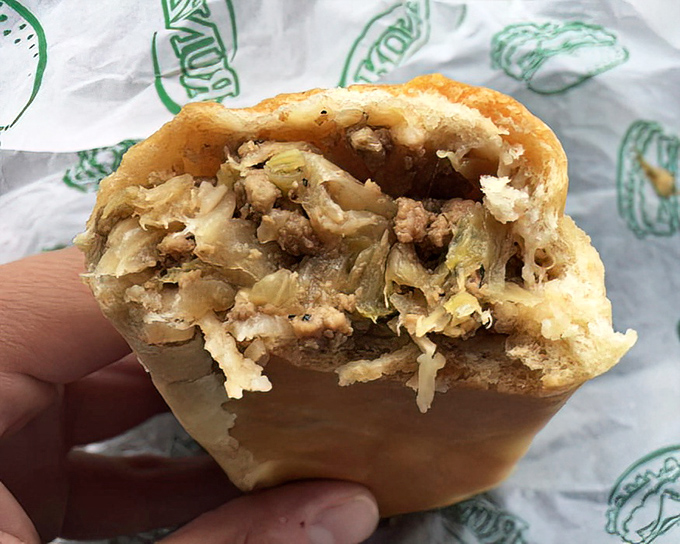 Behold the star of the show&mdash;seasoned beef, cabbage, and onions tucked into fresh-baked bread like a Midwestern hug in sandwich form.