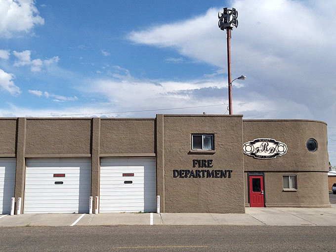 Rupert's volunteer fire department stands ready with its bright red door – a reassuring sight in a town where neighbors still look out for each other.