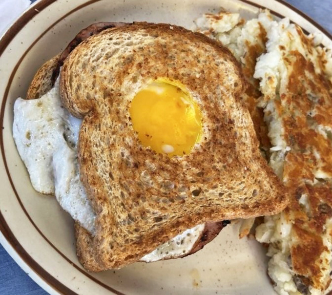 Mickey's "One Eyed Jack" sandwich proves that sometimes the simplest pleasures&mdash;toast, egg, and ham&mdash;create the most satisfying symphony on a plate.
