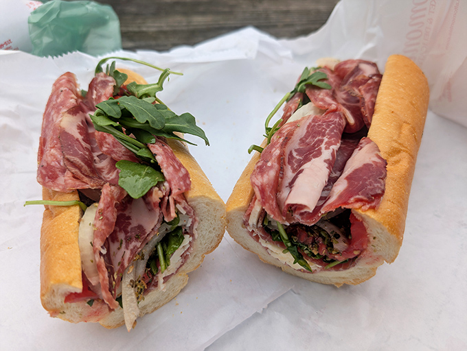 This isn't just a sandwich&mdash;it's architecture with prosciutto. Look at those layers! The arugula adds just the right peppery counterpoint.