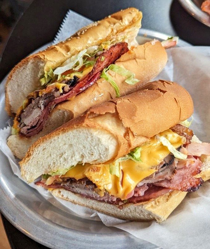 Architectural masterpieces aren't just found in museums&mdash;they're stacked between bread here, where layers of meat and cheese create edible sculptures worth traveling for.