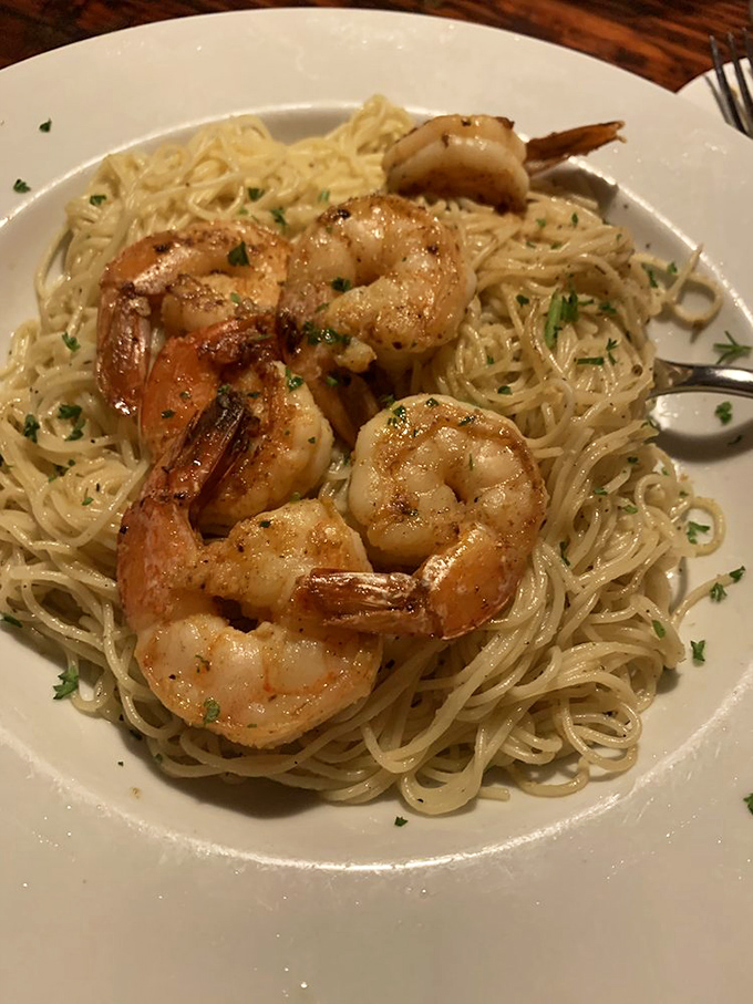 Shrimp scampi that makes you question every other version you've ever had&mdash;plump Gulf shrimp lounging in buttery garlic sauce like they own the place.