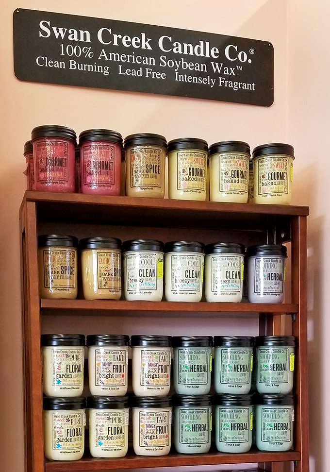 Swan Creek's candle display is organized better than my entire life. The "Gourmet" scents probably smell like your grandmother's kitchen on Sunday.