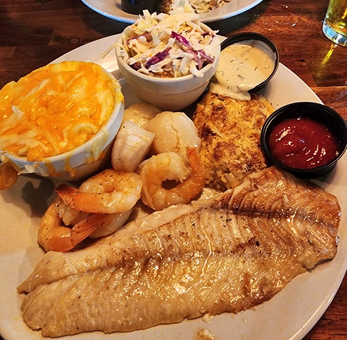 A seafood feast that makes you want to send a thank-you note to the ocean. That mac and cheese is practically glowing with cheesy promise.