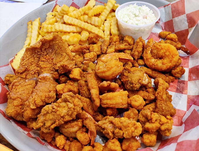Golden treasures from the Gulf. This mountain of perfectly fried seafood makes you wonder why anyone would eat anything else in Florida.