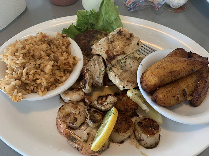 This isn't just a seafood platter; it's a flavor geography lesson of the Gulf with perfectly grilled shrimp, fish, and those plantains!