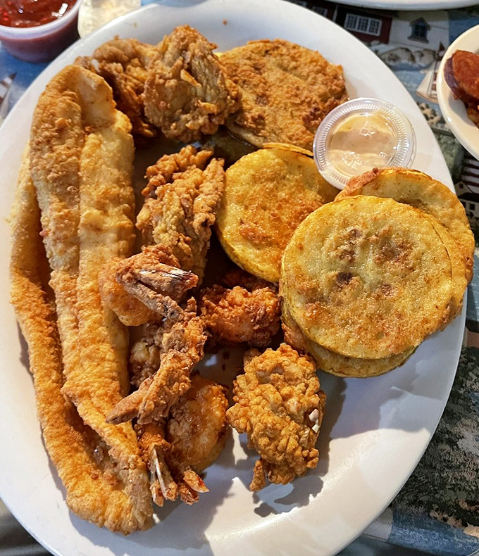 Golden-fried perfection that makes you wonder why anyone would eat seafood any other way. The fish practically winks at you.