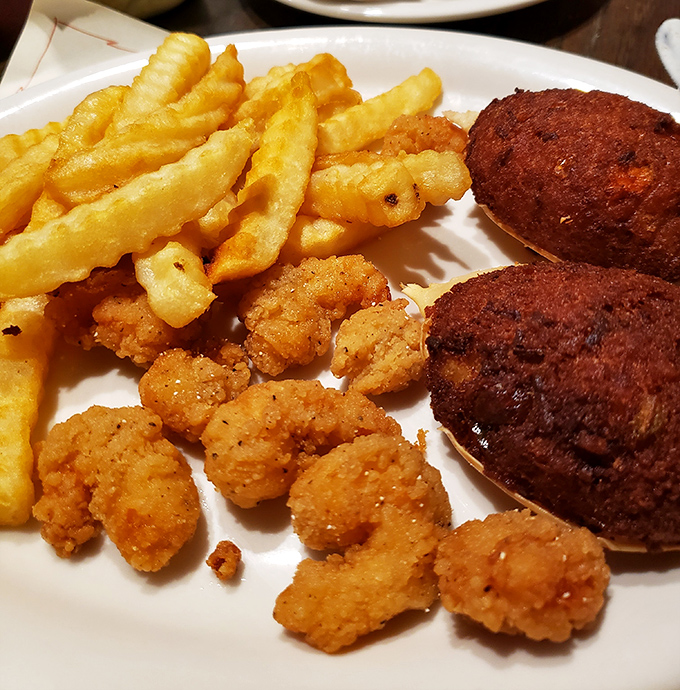 Golden-fried treasures from the Tennessee River arrive with crispy shrimp and hushpuppies &ndash; a plate that makes you understand why people drive for hours.