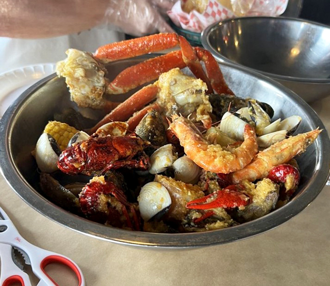 Seafood heaven in a metal bowl. Snow crab legs and jumbo shrimp mingle with crawfish in a spice-laden party that would make Neptune jealous.