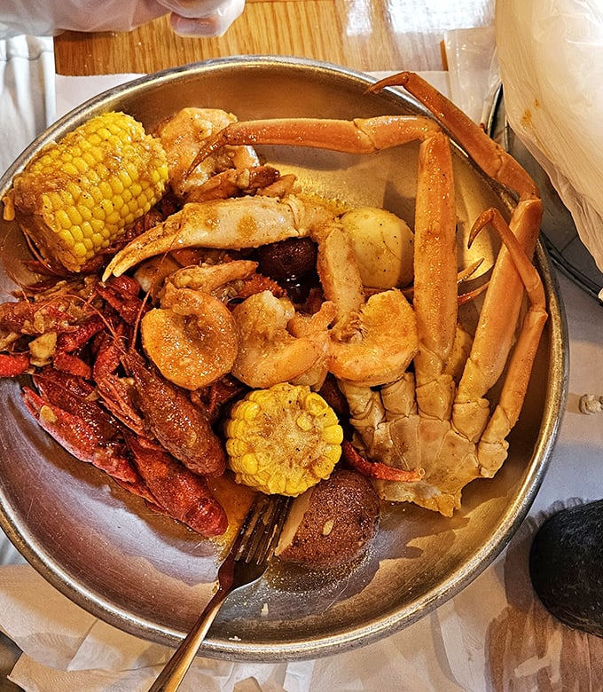 Not so much a meal as a treasure hunt&mdash;snow crab legs, crawfish, shrimp, and corn on the cob swimming in seasoned butter glory.