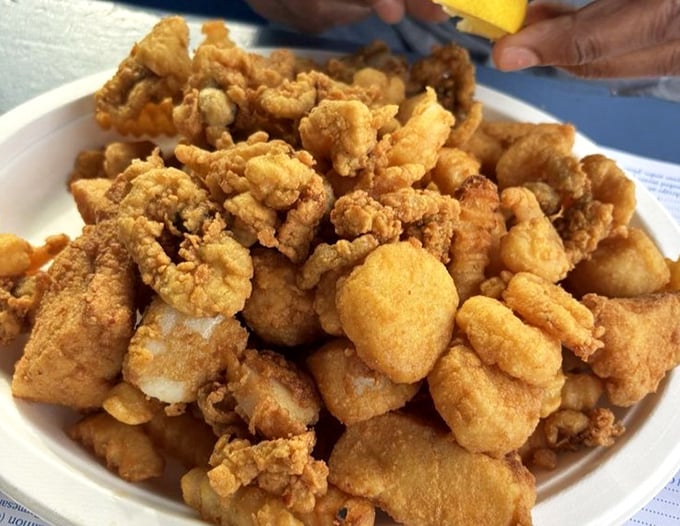 Golden-fried seafood piled high on a plate&mdash;this isn't just food, it's edible sunshine that crunches between your teeth and tastes like vacation.