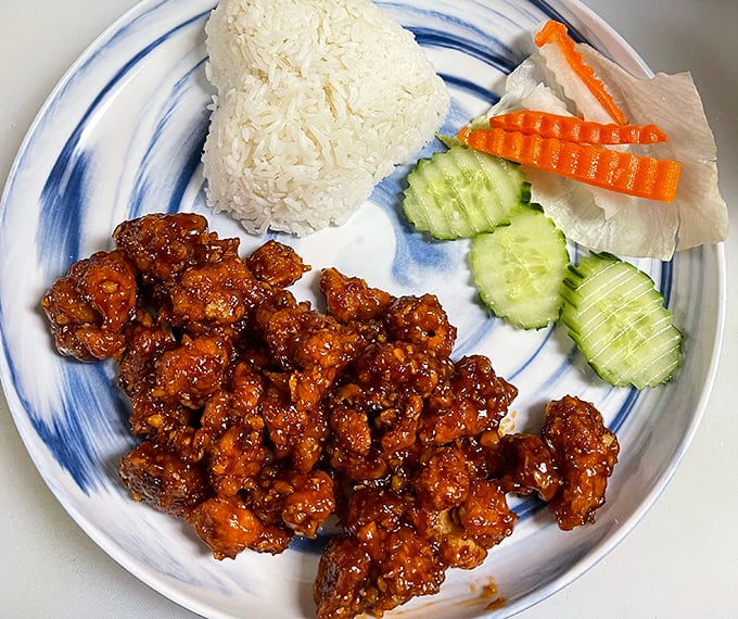 Glossy, sesame-studded chicken sitting beside perfectly steamed rice&mdash;this is the dish that launched a thousand road trips across South Carolina.