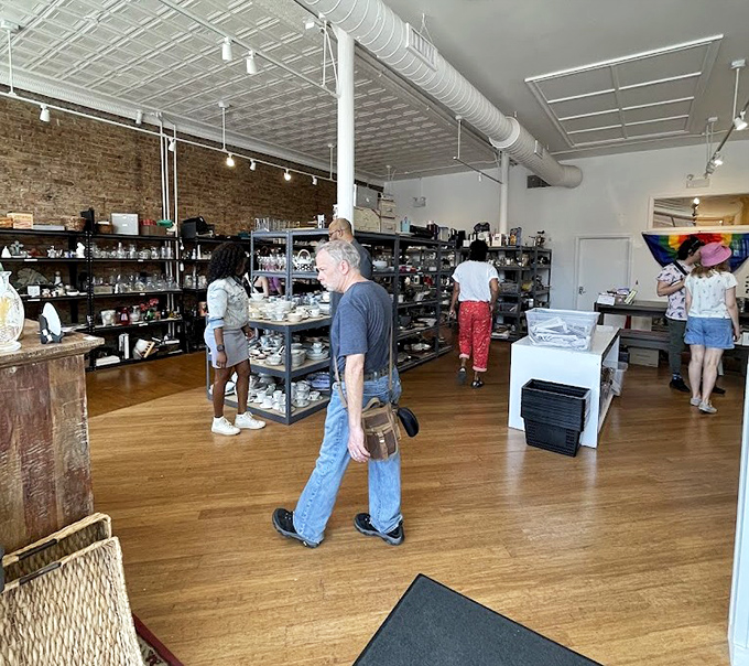 Shoppers navigate the well-organized housewares section, where yesterday's kitchen treasures await their second act in someone else's culinary story.