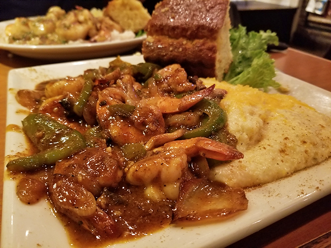 Shrimp and grits so good they should have their own ZIP code. Those plump shrimp lounging on creamy grits are basically having their own spa day.