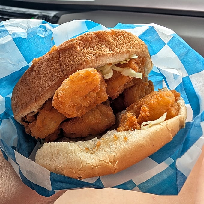The legendary shrimp burger in all its glory. Like Neptune himself decided to bless a sandwich with the ocean's finest bounty.