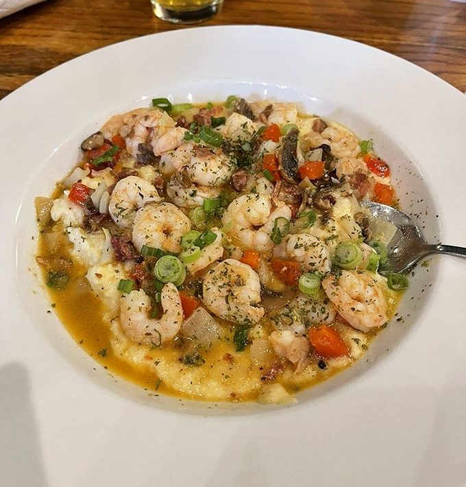 This isn't just Shrimp & Grits&mdash;it's a Southern symphony where plump local shrimp dance with creamy grits in perfect harmony.
