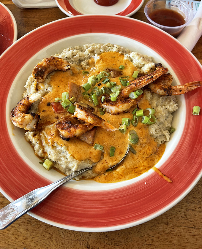 The legendary shrimp and grits&mdash;where Cajun-spiced Gulf shrimp perform a delicious ballet atop creamy, cheesy perfection.
