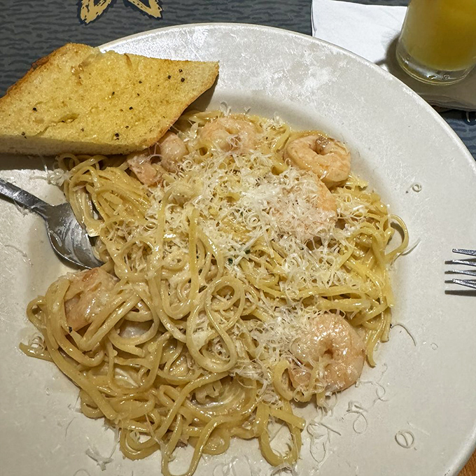 Shrimp scampi pasta that's achieved the perfect balance – enough garlic to keep vampires at bay, enough butter to make Julia Child proud.