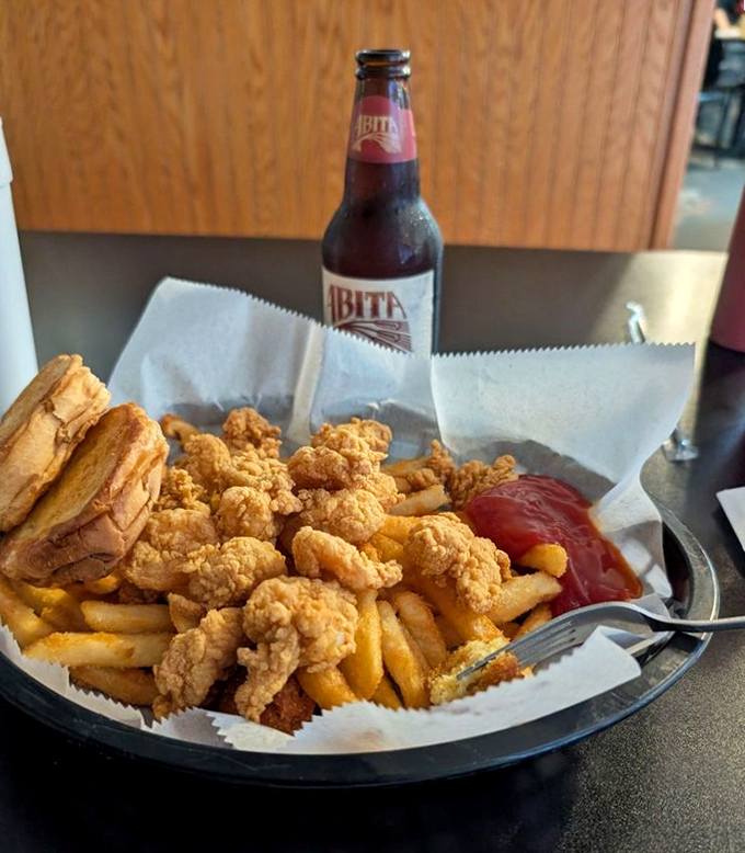 Golden-fried shrimp that crunch like nature's perfect potato chip, paired with fries and an Abita &ndash; the Mississippi trinity of happiness.