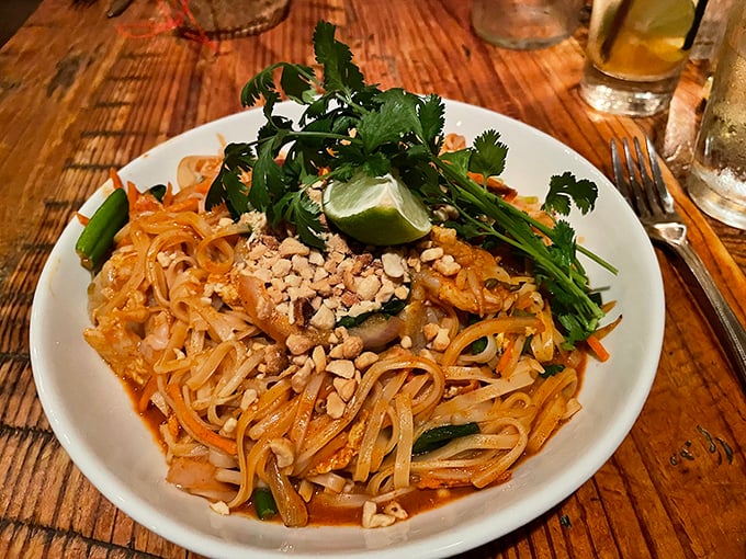 This Pad Thai isn't just noodles&mdash;it's a tangle of textures crowned with crushed peanuts and fresh herbs that'll make you question every other version you've tried.