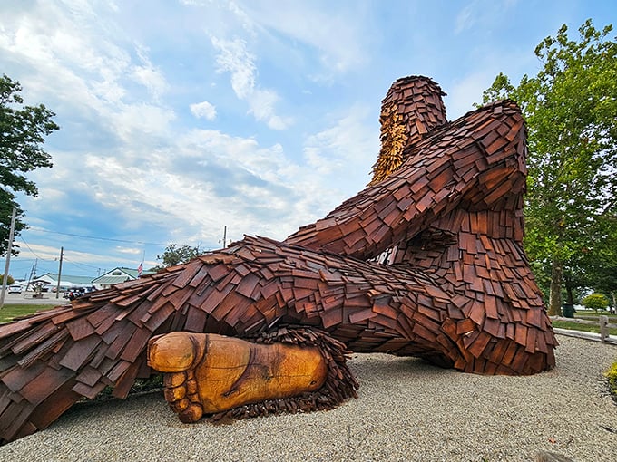 From this angle, you can truly appreciate the massive scale of this wooden wonder. Nelson's reclined posture suggests he's settling in for the long haul.