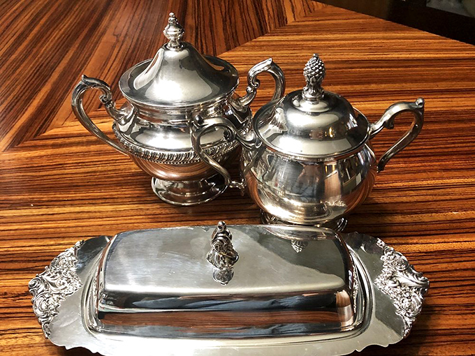 Silver that tells stories! This elegant tea service set waits patiently for its next dinner party, ready to elevate someone's entertaining game for pennies on the dollar.