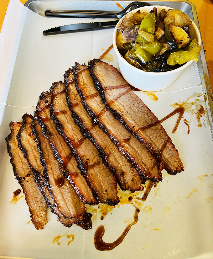 Brisket that doesn't need Instagram filters. Those smoke rings aren't special effects&mdash;they're the result of patience, expertise, and fire.