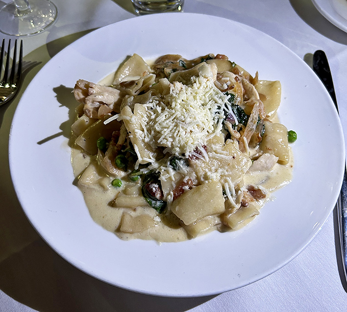 Behold the legendary Smoked Chicken Rigatoni in all its glory &ndash; pasta tubes swimming in creamy sauce with tender chicken and bright green peas.