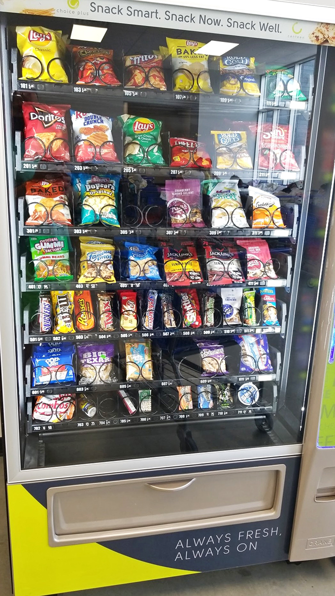 Even bargain hunters need fuel! The vending machine stands ready with snacks to power your thrifting marathon.
