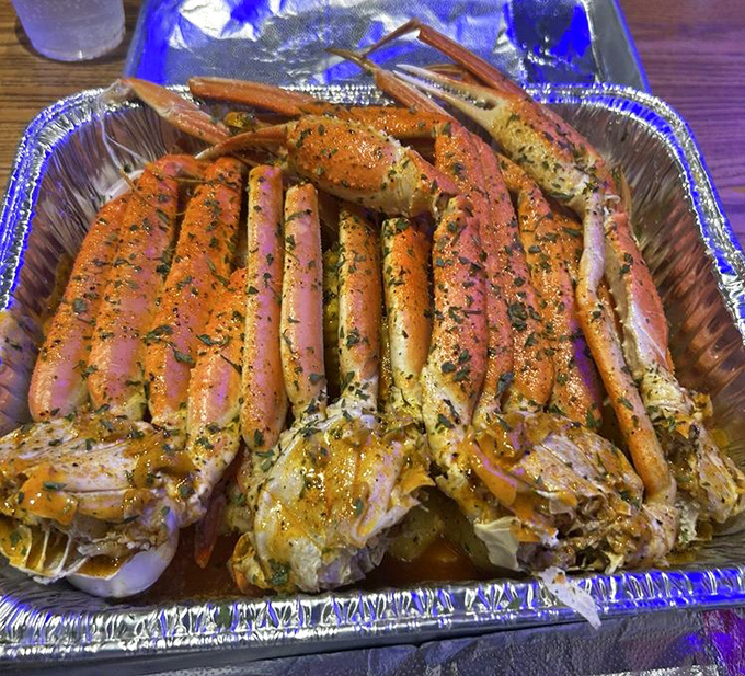 These snow crab legs arrive dressed to impress in garlic butter and herbs – pure edible gold.