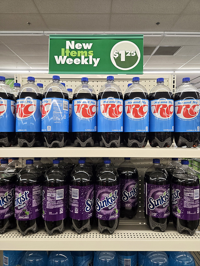 The beverage aisle: where RC Cola gets prime real estate and Sunkist Grape reminds you of childhood summers, all under a "New Items Weekly" promise.