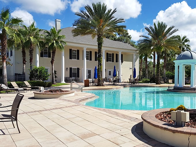 Southern elegance meets resort living at this stately clubhouse, where palm trees stand guard over a swimming pool that beckons on hot Florida afternoons.