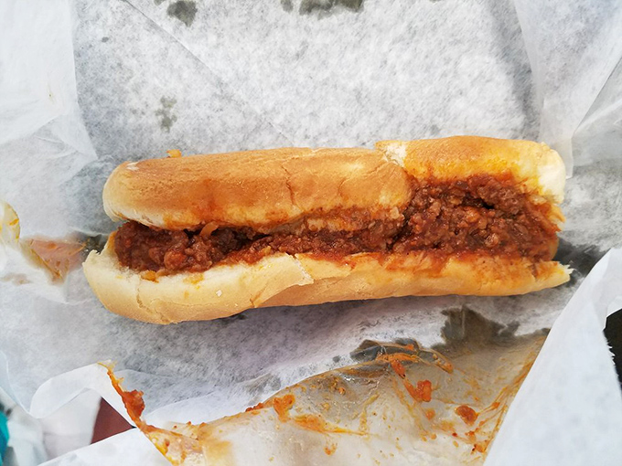 Meet the star of the show! The Spanish Dog comes dressed in its signature sauce&mdash;a rich, slightly sweet concoction that's worth every mile of your journey.