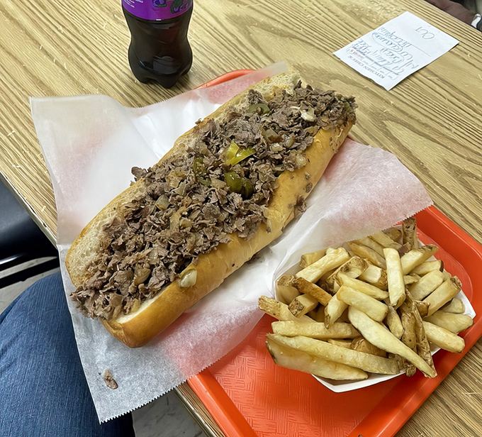 Behold the star of the show: a cheesesteak so perfectly chopped and seasoned it might make a Philadelphian question their loyalty.
