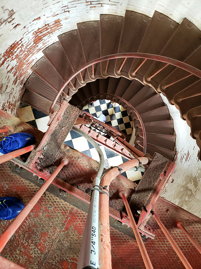 Looking up the dizzying spiral staircase reveals the lighthouse's inner beauty&mdash;257 steps of history that have carried keepers, visitors, and countless stories upward.