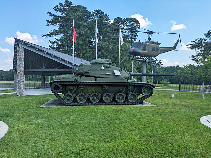 Military history buffs, rejoice! This vintage tank and helicopter display at Sportsman Lake Park offers a moment of reflection and appreciation for service members.