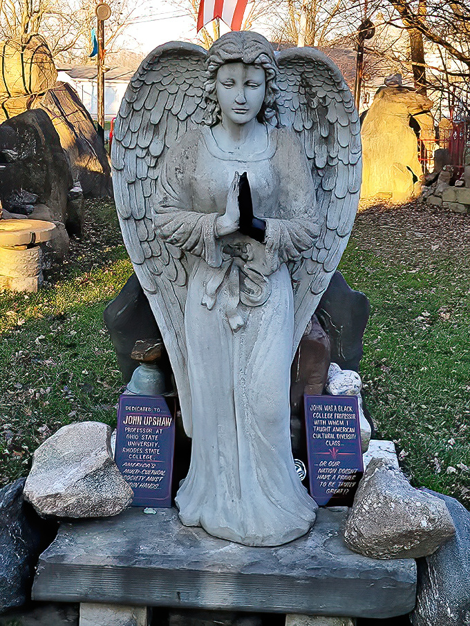 Not your average garden statue! This angel's peaceful presence adds a spiritual dimension to the rock garden, inviting quiet reflection among the stones.