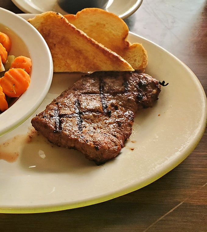 When your steak arrives with that perfect char and pink center, you'll understand why people drive hours for this.