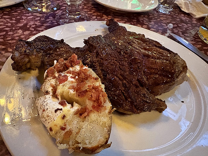 This isn't just a steak; it's a declaration of independence from mediocre meals. That loaded baked potato isn't playing a supporting role&mdash;it's co-starring.