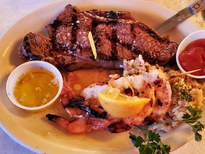 The surf-and-turf platter that answers the eternal question: "Why choose between land and sea when both can coexist so beautifully?"