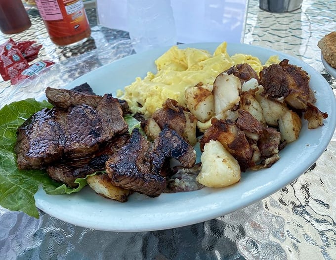 Behold the star attraction: steak and eggs that would make Ron Swanson weep with joy. Perfectly seasoned beef alongside fluffy scrambled eggs and home fries.