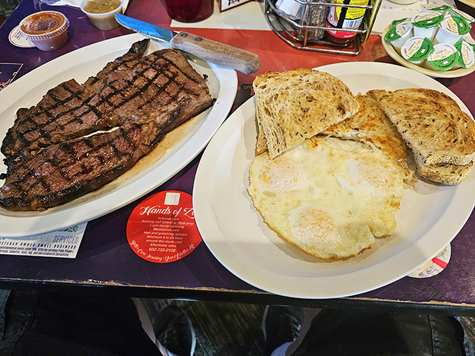 A steak with perfect grill marks alongside eggs and toast&mdash;the breakfast equivalent of a power suit. You'll feel invincible after this.