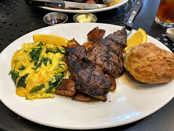 This isn't just steak and eggs&mdash;it's a carnivore's dream come true, with perfectly grilled flat iron steak and spinach-flecked scrambled eggs.